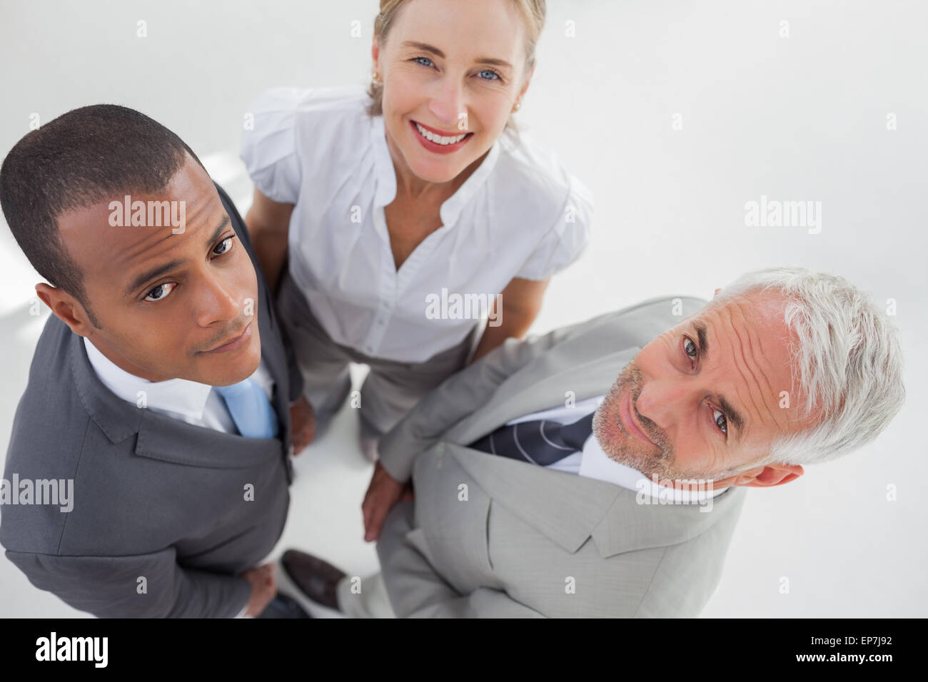 Overview of three business people standing close to each other Stock ...