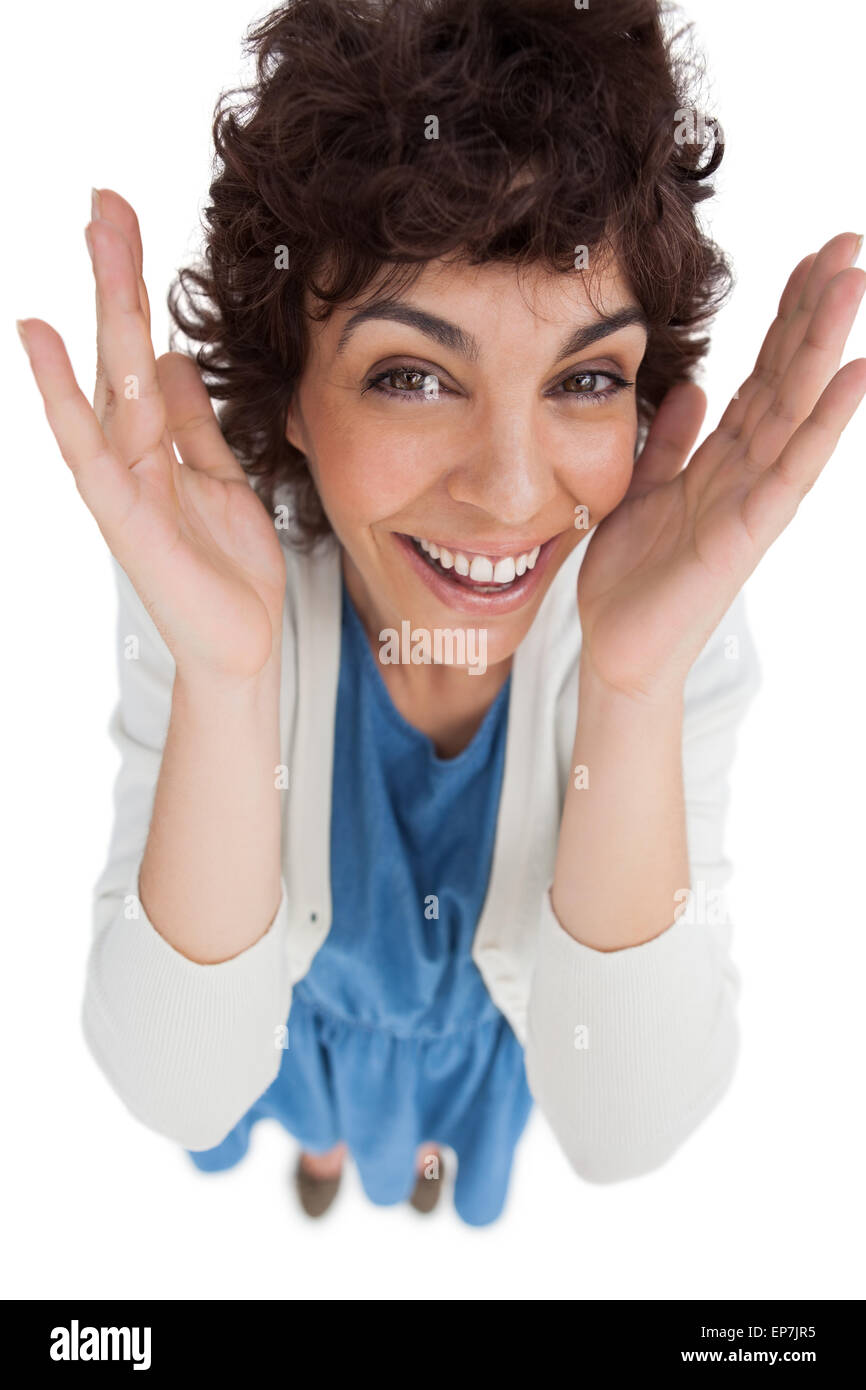 Overhead of surprised woman with hands wide opened Stock Photo - Alamy