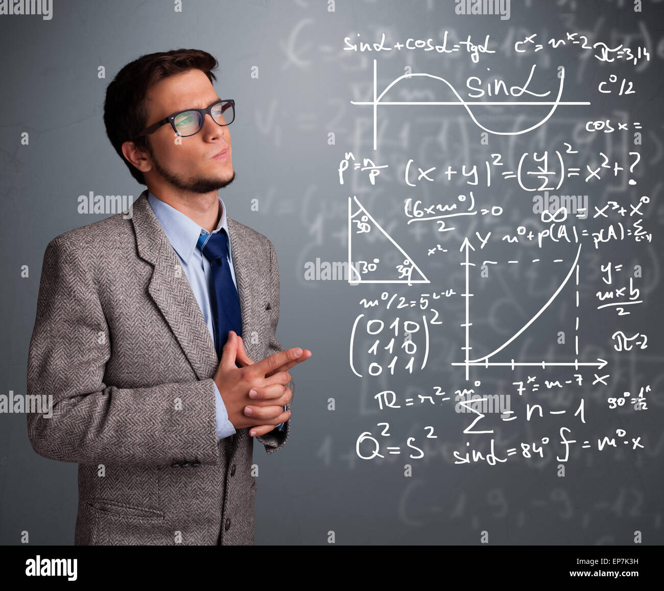 Handsome school boy thinking about complex mathematical signs Stock ...