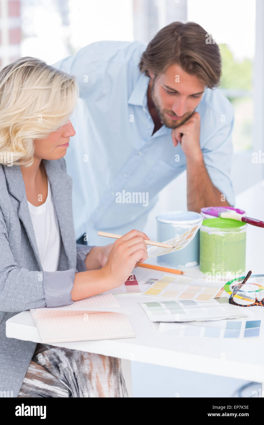 Colleagues of interior design working together on colour charts Stock ...