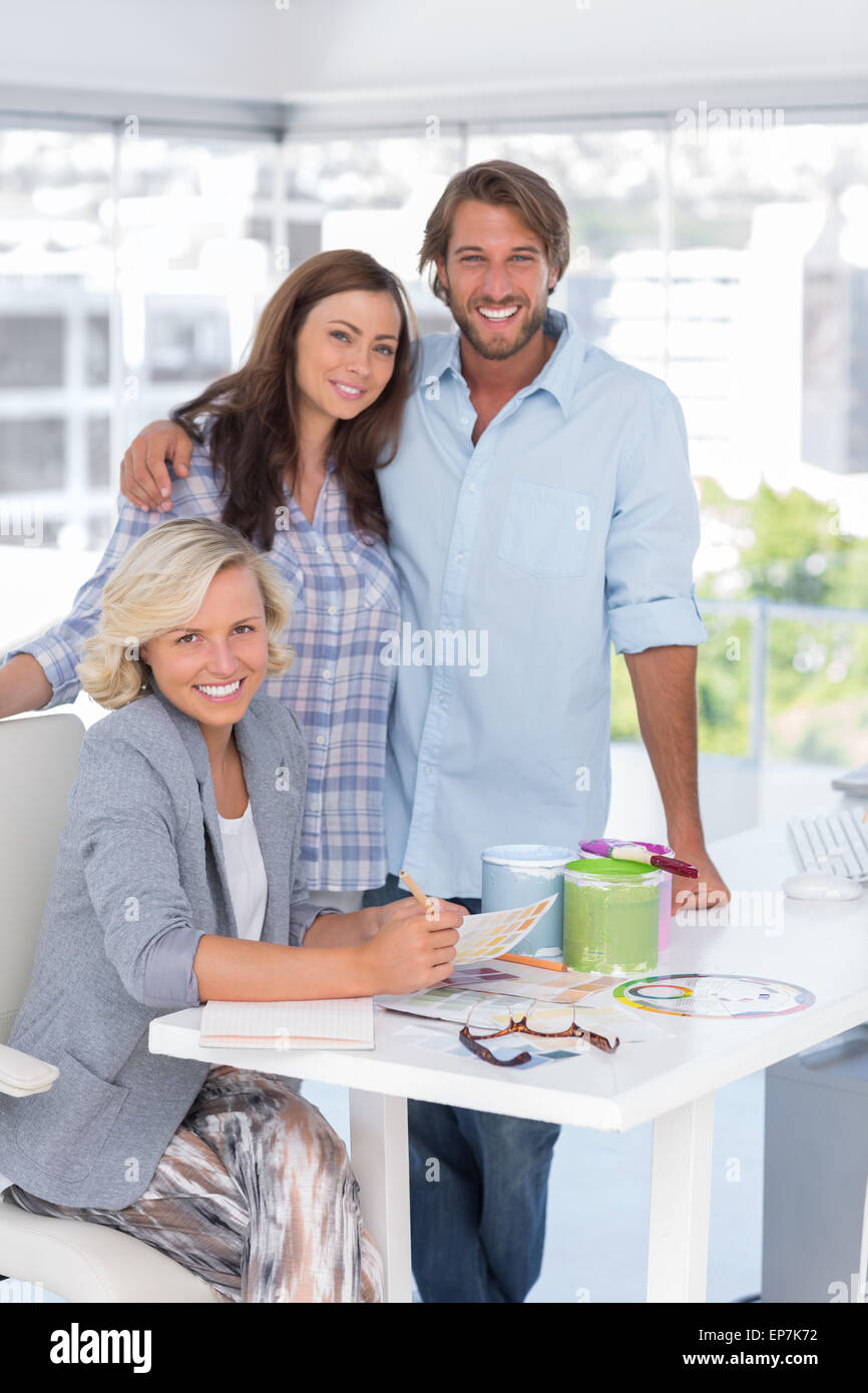 United team of interior designer standing together Stock Photo - Alamy