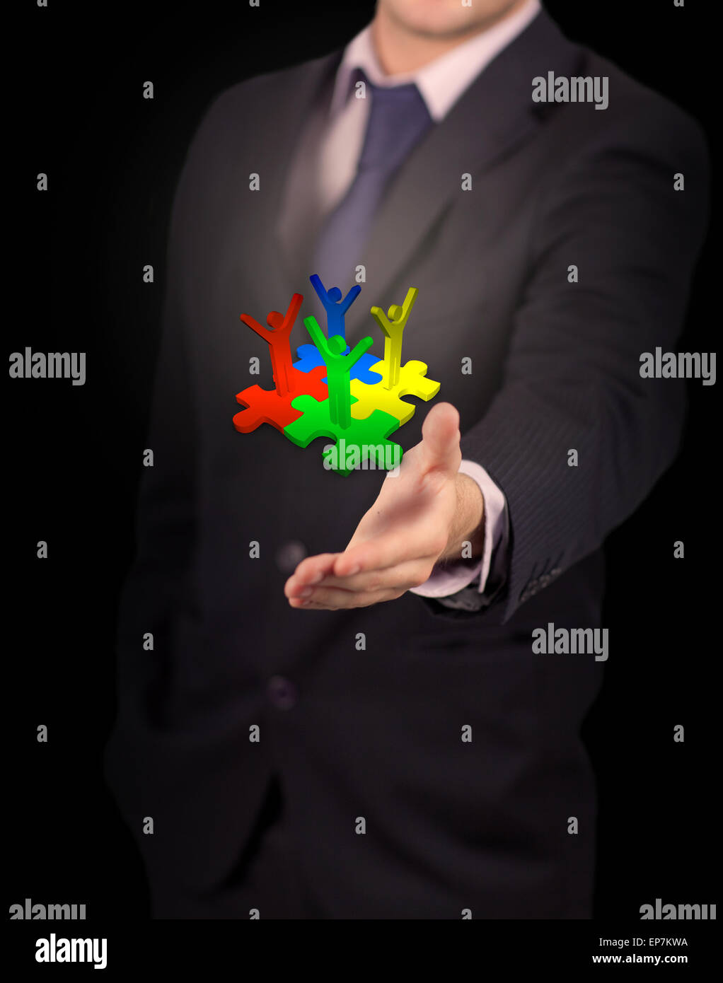 Businessman presenting human forms with raised arms Stock Photo - Alamy