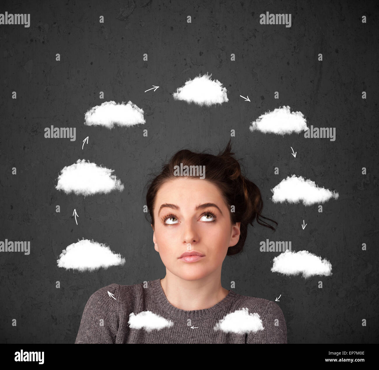 Young woman thinking with cloud circulation around her head Stock Photo ...