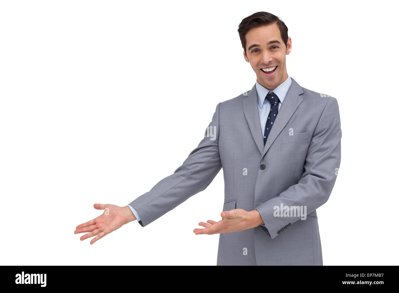 Happy businessman giving a presentation with his hands Stock Photo - Alamy