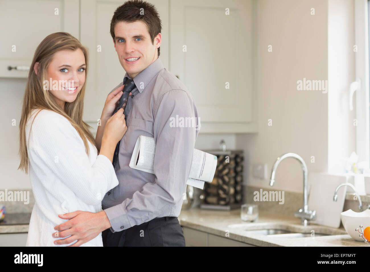 Tie under his arm hi-res stock photography and images - Alamy