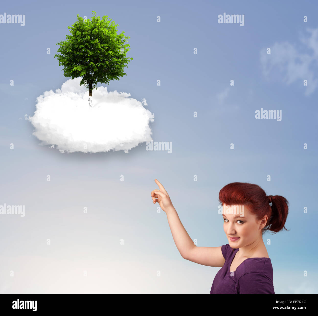 Young girl pointing at a green tree on top of a white cloud Stock Photo ...