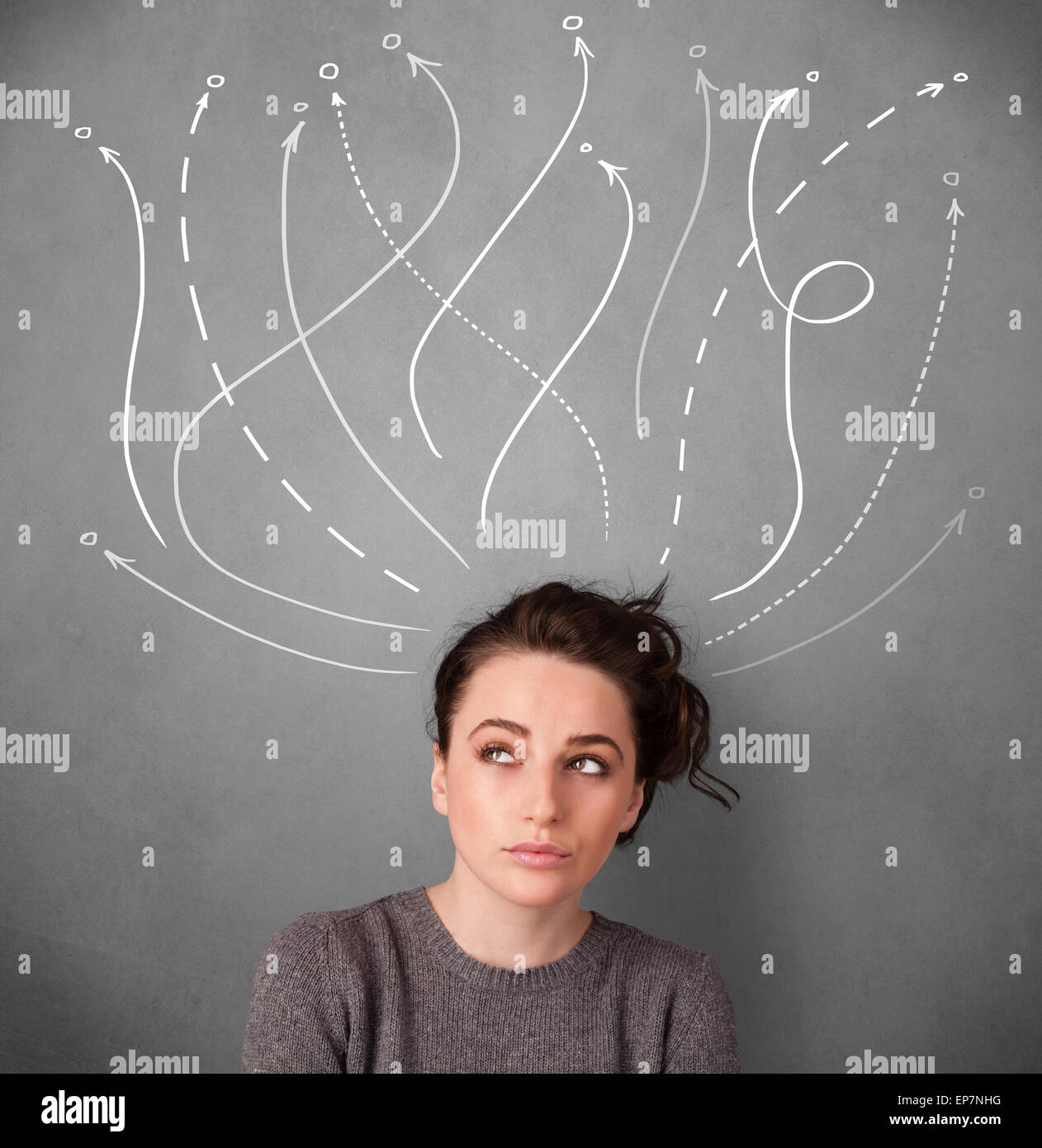 Young woman with arrows coming out of her head Stock Photo - Alamy