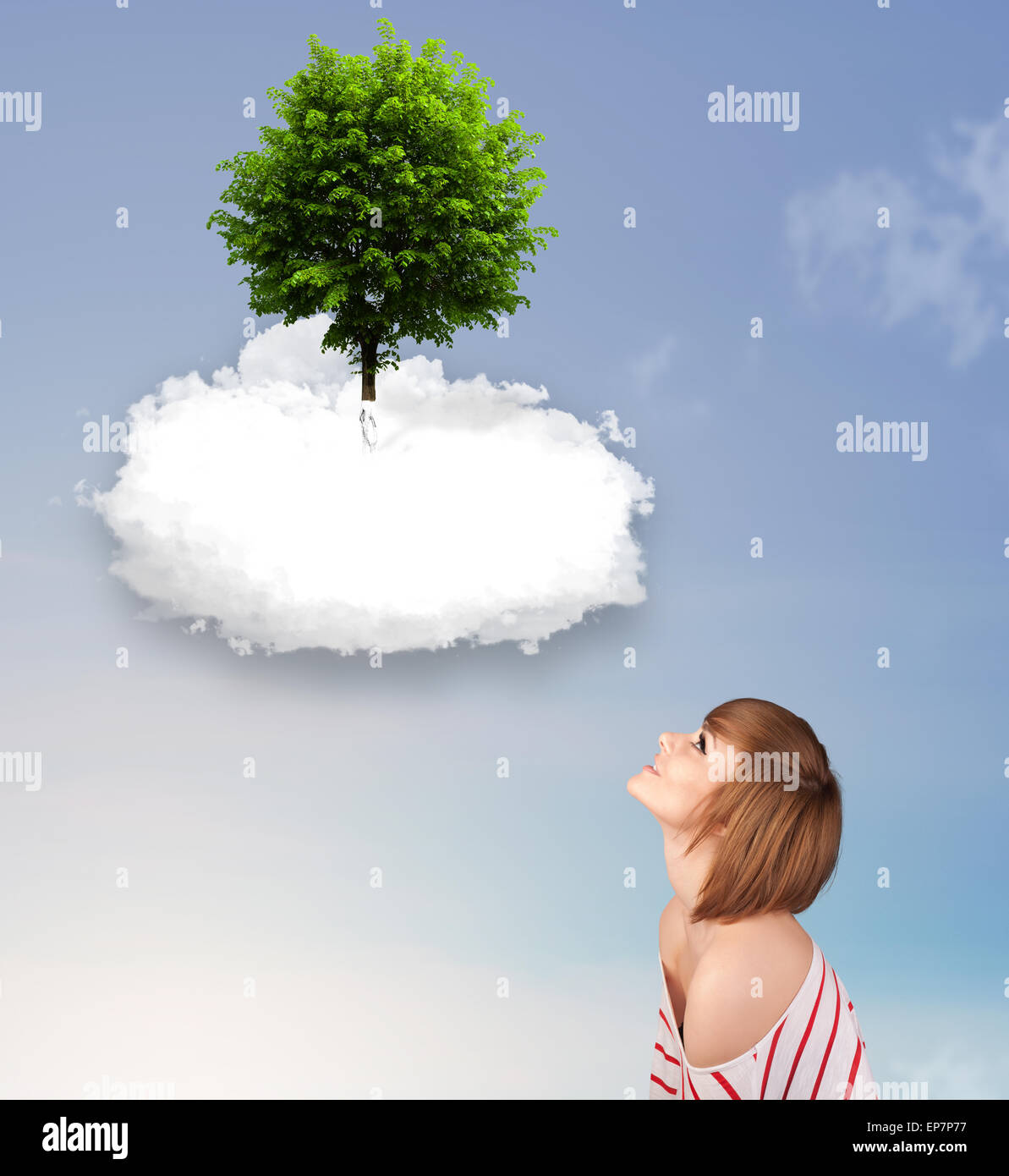 Young girl pointing at a green tree on top of a white cloud Stock Photo ...