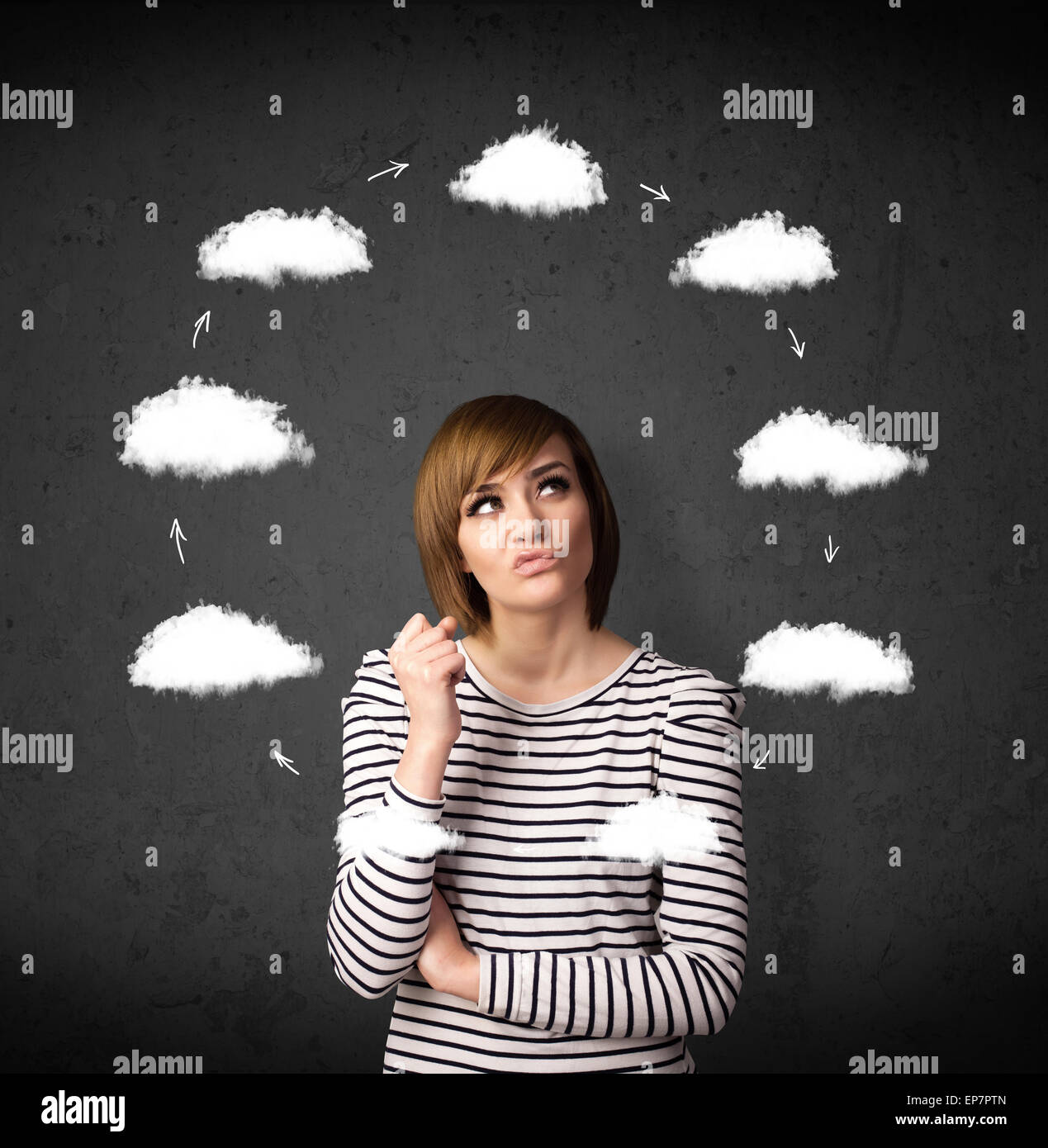 Young woman thinking with cloud circulation around her head Stock Photo ...