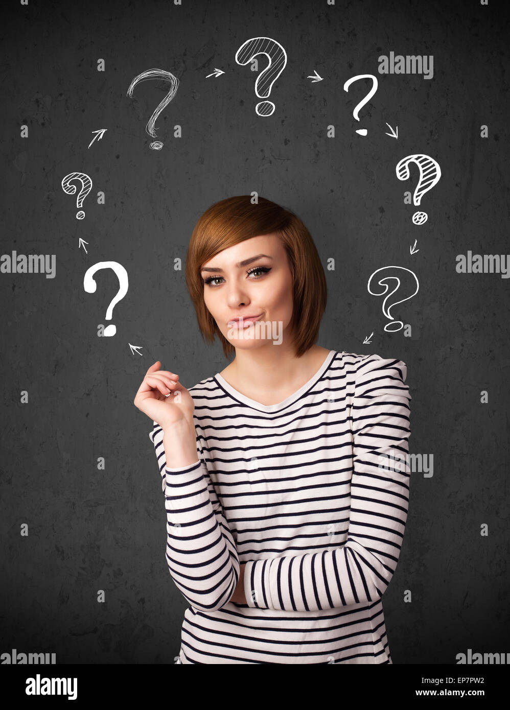 Young woman thinking with question mark circulation around her head ...