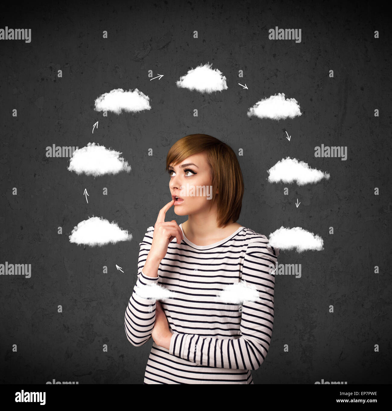 Young woman thinking with cloud circulation around her head Stock Photo ...