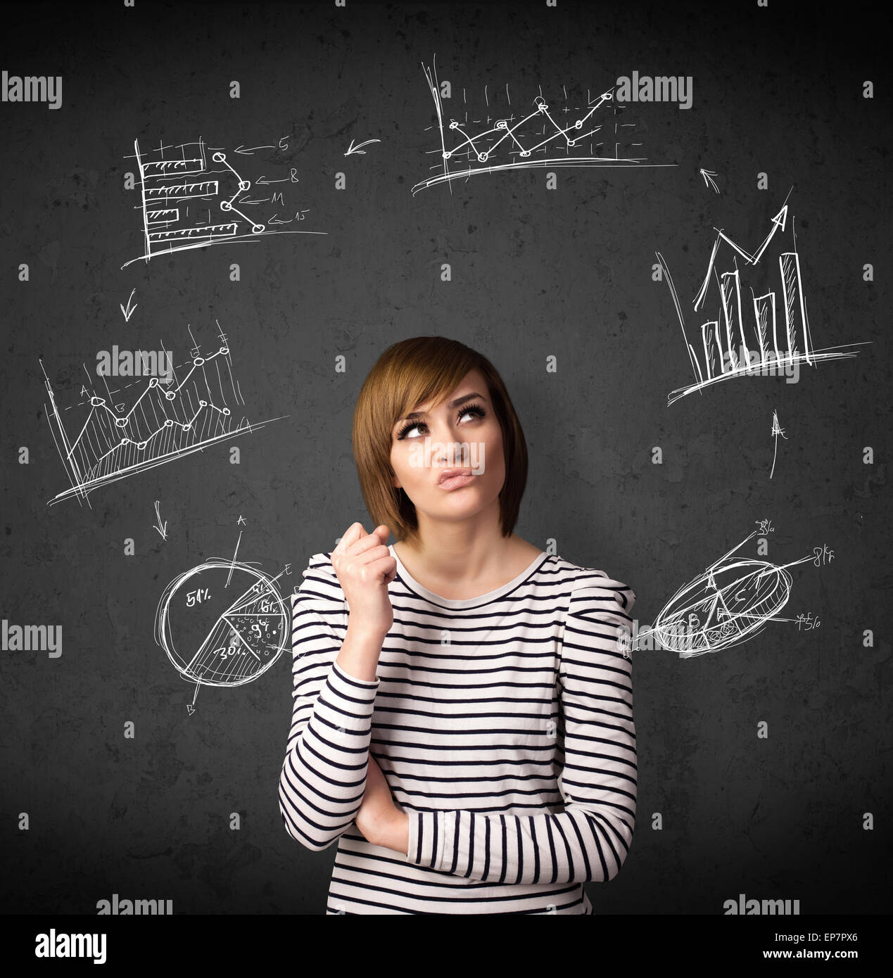 Young woman thinking with charts circulation around her head Stock ...