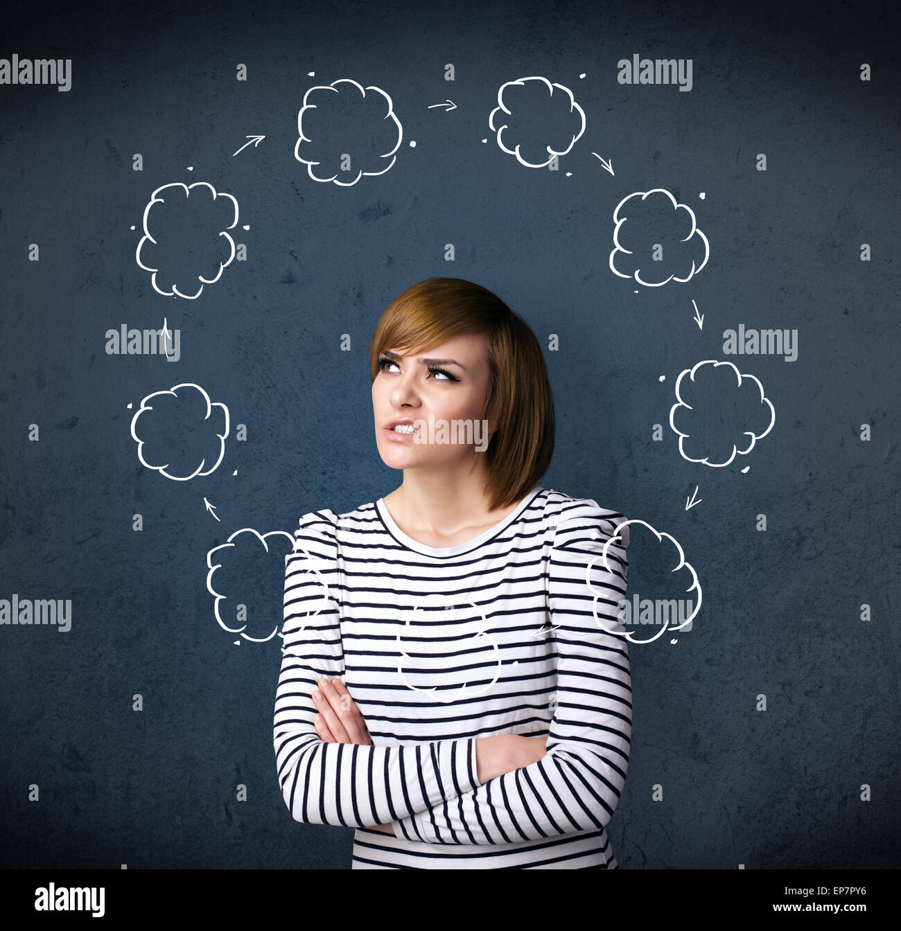 Young woman thinking with cloud circulation around her head Stock Photo ...