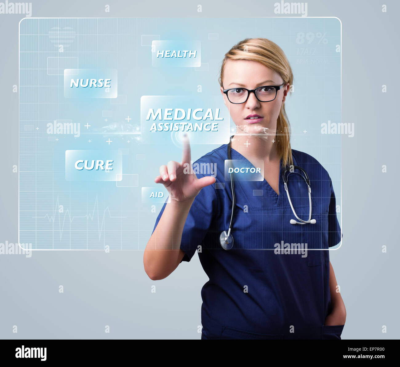 Young nurse pressing modern medical type of buttons Stock Photo - Alamy