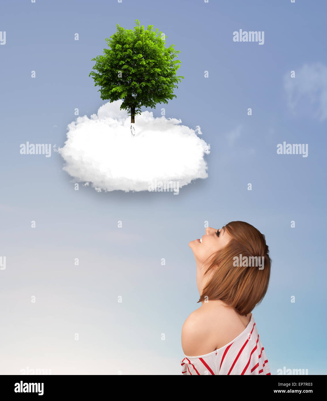 Young girl pointing at a green tree on top of a white cloud Stock Photo ...