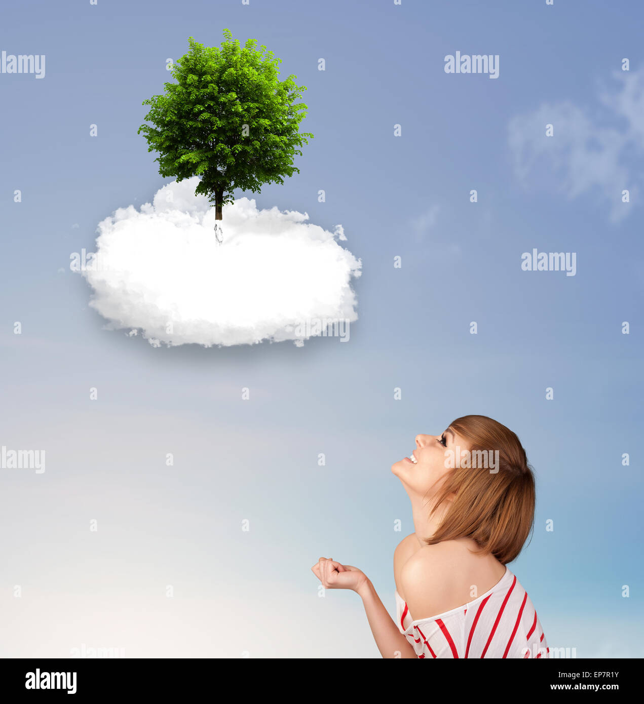 Young girl pointing at a green tree on top of a white cloud Stock Photo ...