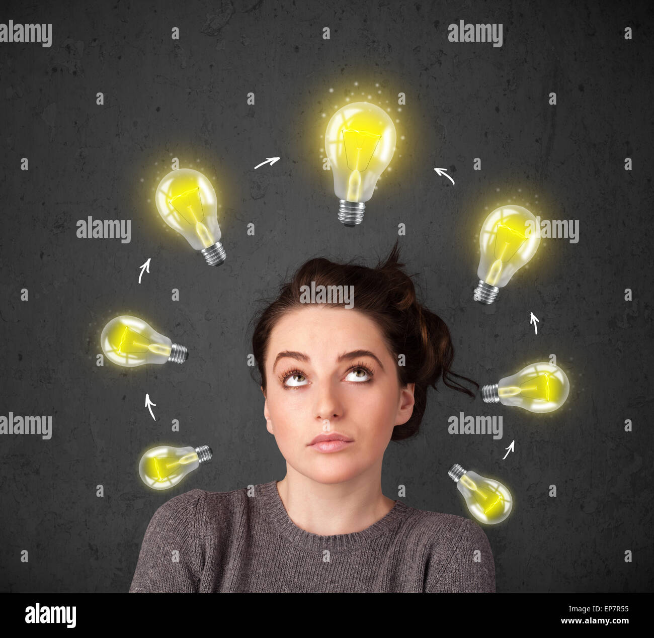 Young woman thinking with lightbulb circulation around her head Stock ...