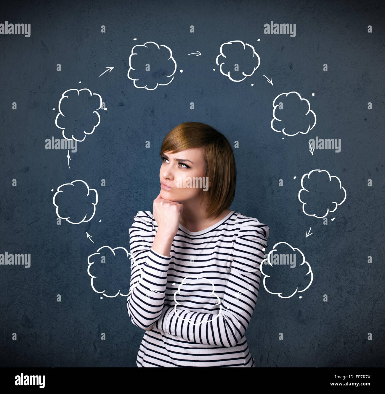 Young woman thinking with cloud circulation around her head Stock Photo ...