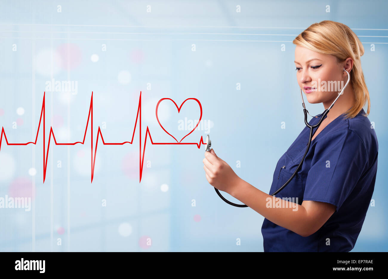 Young nurse listening to abstract pulse with red heart Stock Photo - Alamy