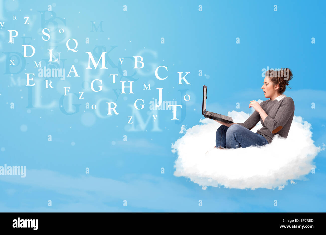 Young woman sitting in cloud with laptop Stock Photo - Alamy