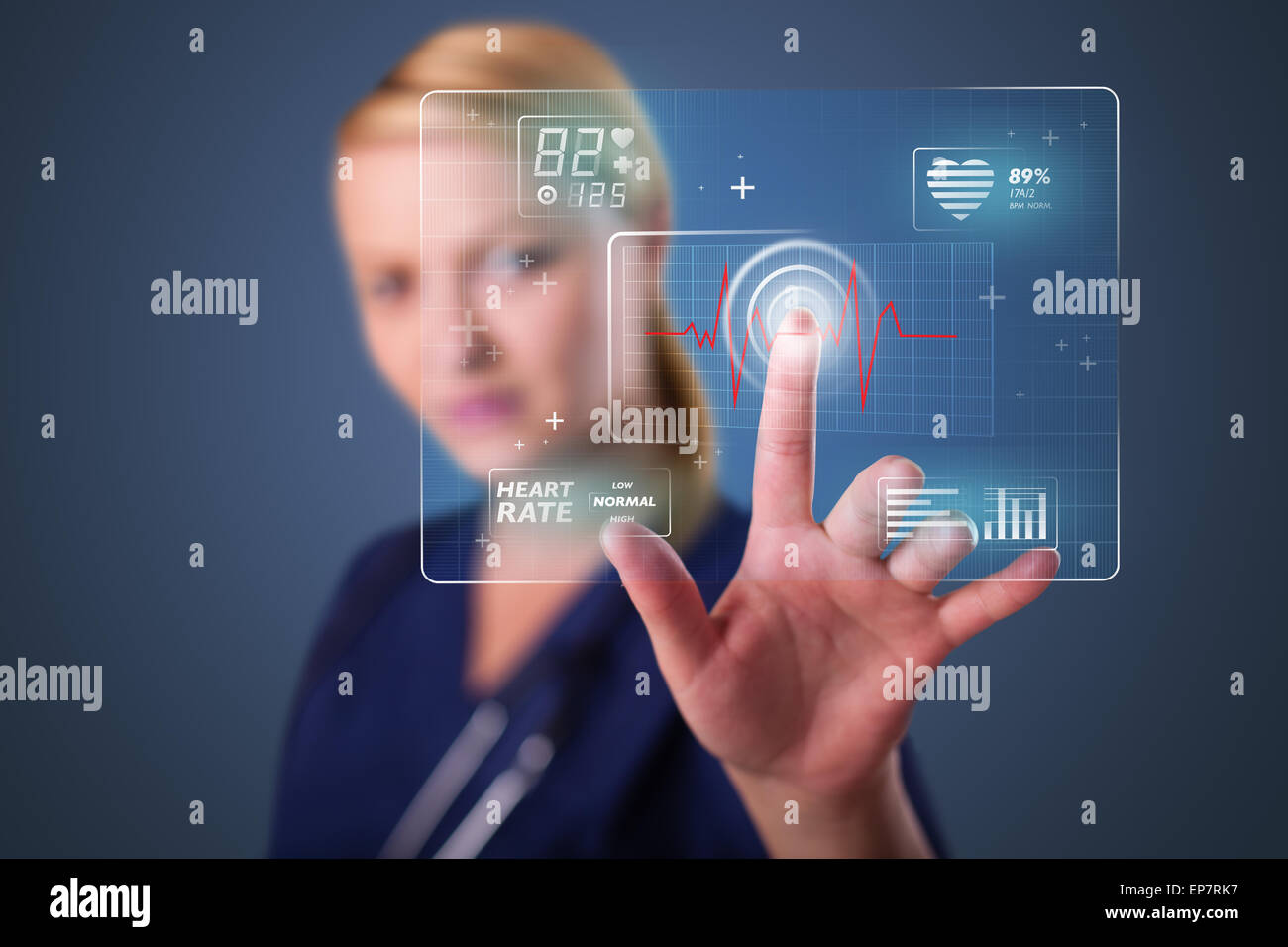 Young nurse pressing modern medical type of buttons Stock Photo - Alamy