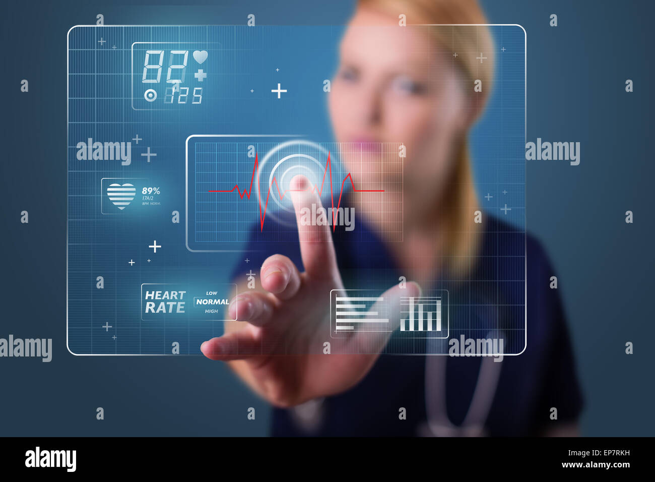 Young nurse pressing modern medical type of buttons Stock Photo - Alamy