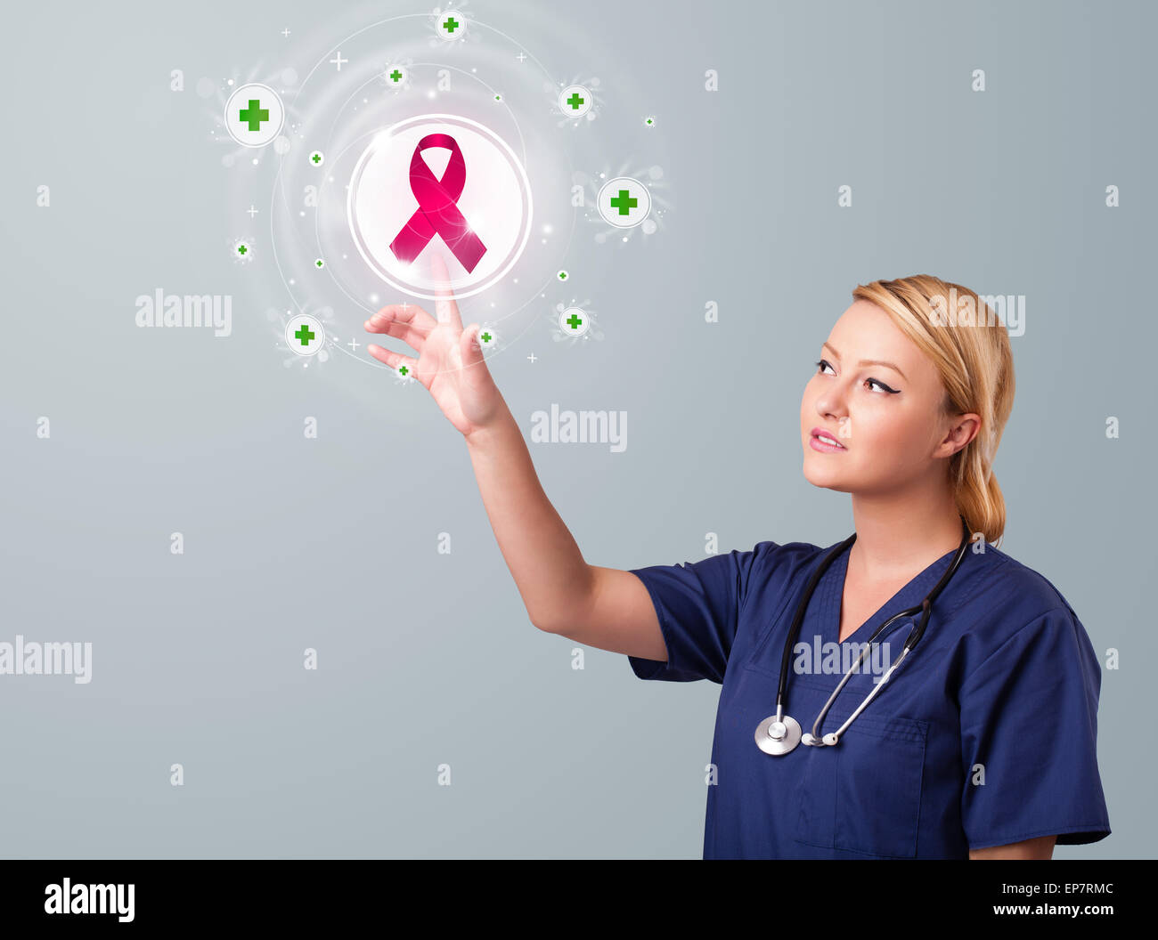 Young nurse pressing modern medical type of buttons Stock Photo - Alamy