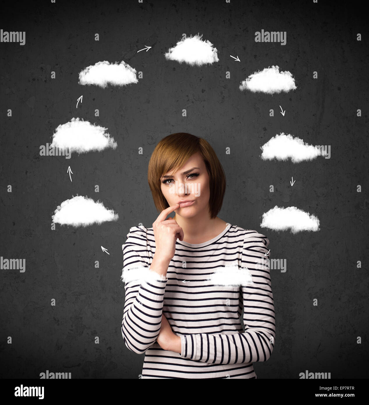 Young woman thinking with cloud circulation around her head Stock Photo ...