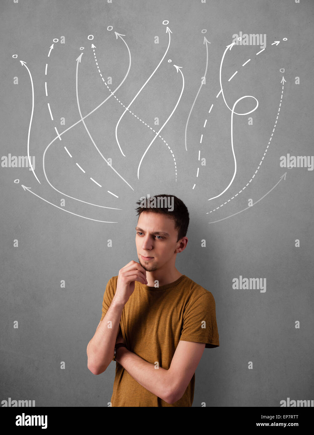 Young man with arrows coming out of his head Stock Photo - Alamy