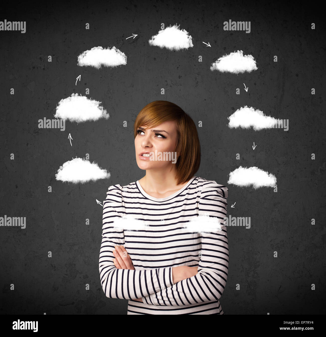 Young woman thinking with cloud circulation around her head Stock Photo ...