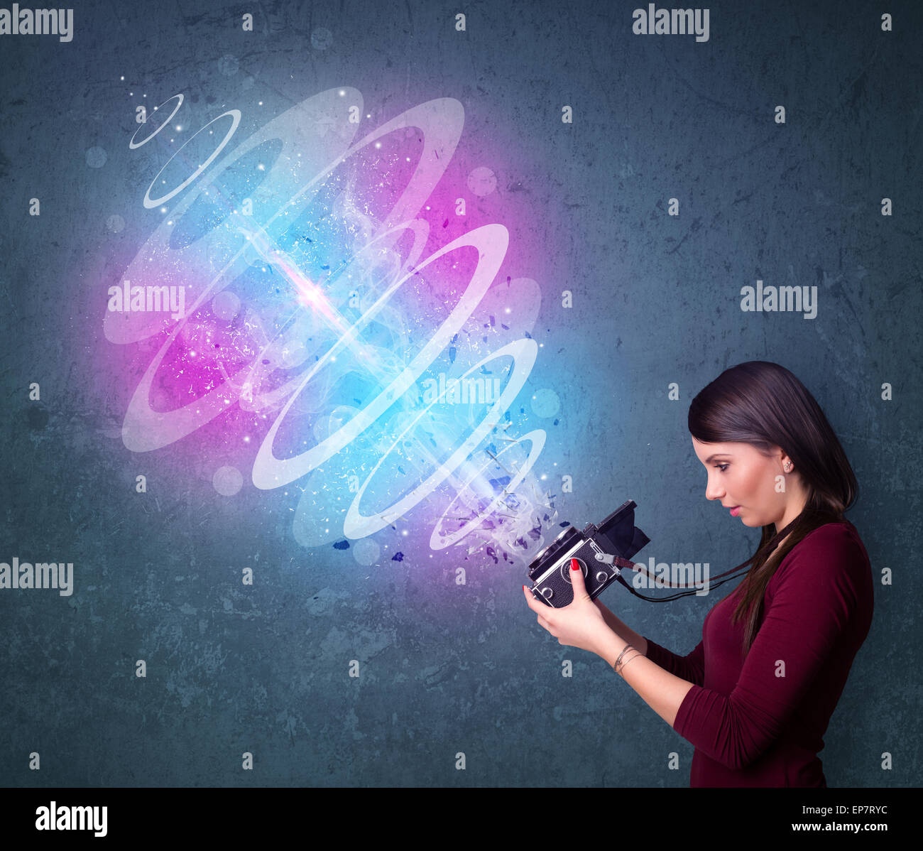 Photographer girl making photos with powerful light beam Stock Photo ...