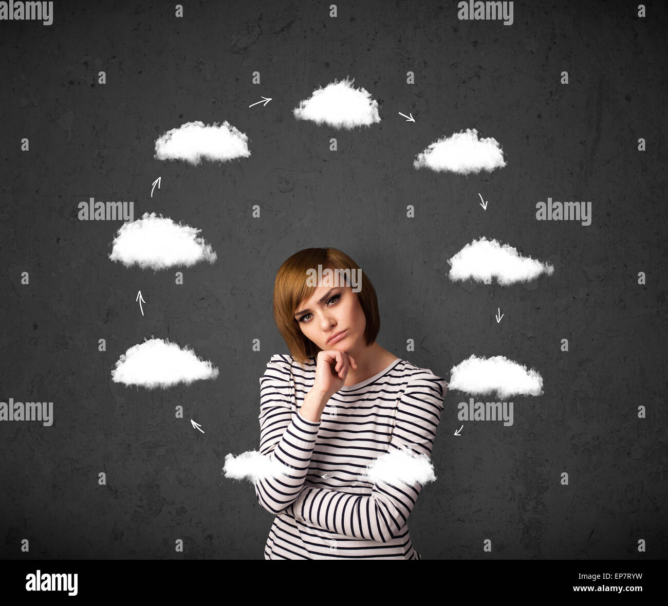 Young woman thinking with cloud circulation around her head Stock Photo ...