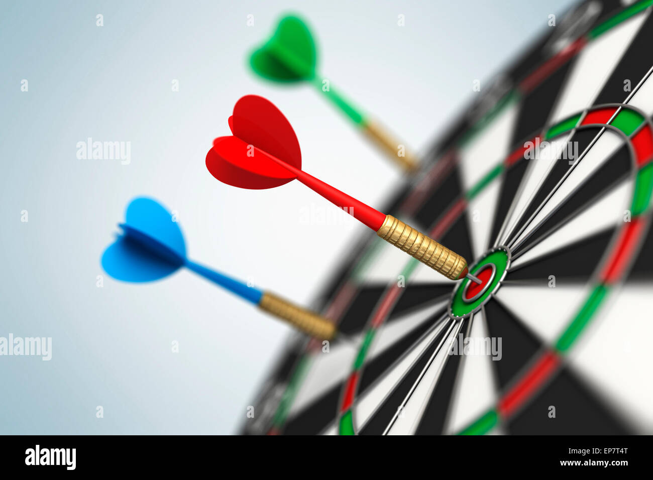 Darts arrow in bull's-eye Stock Photo - Alamy