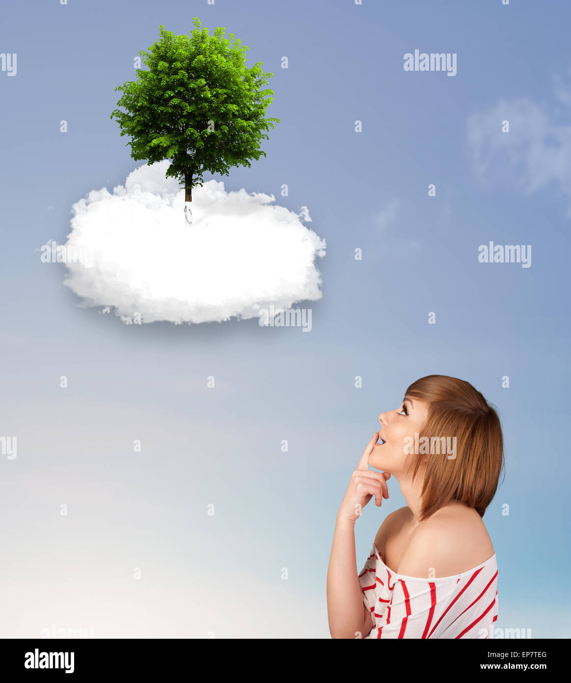 Young girl pointing at a green tree on top of a white cloud Stock Photo ...