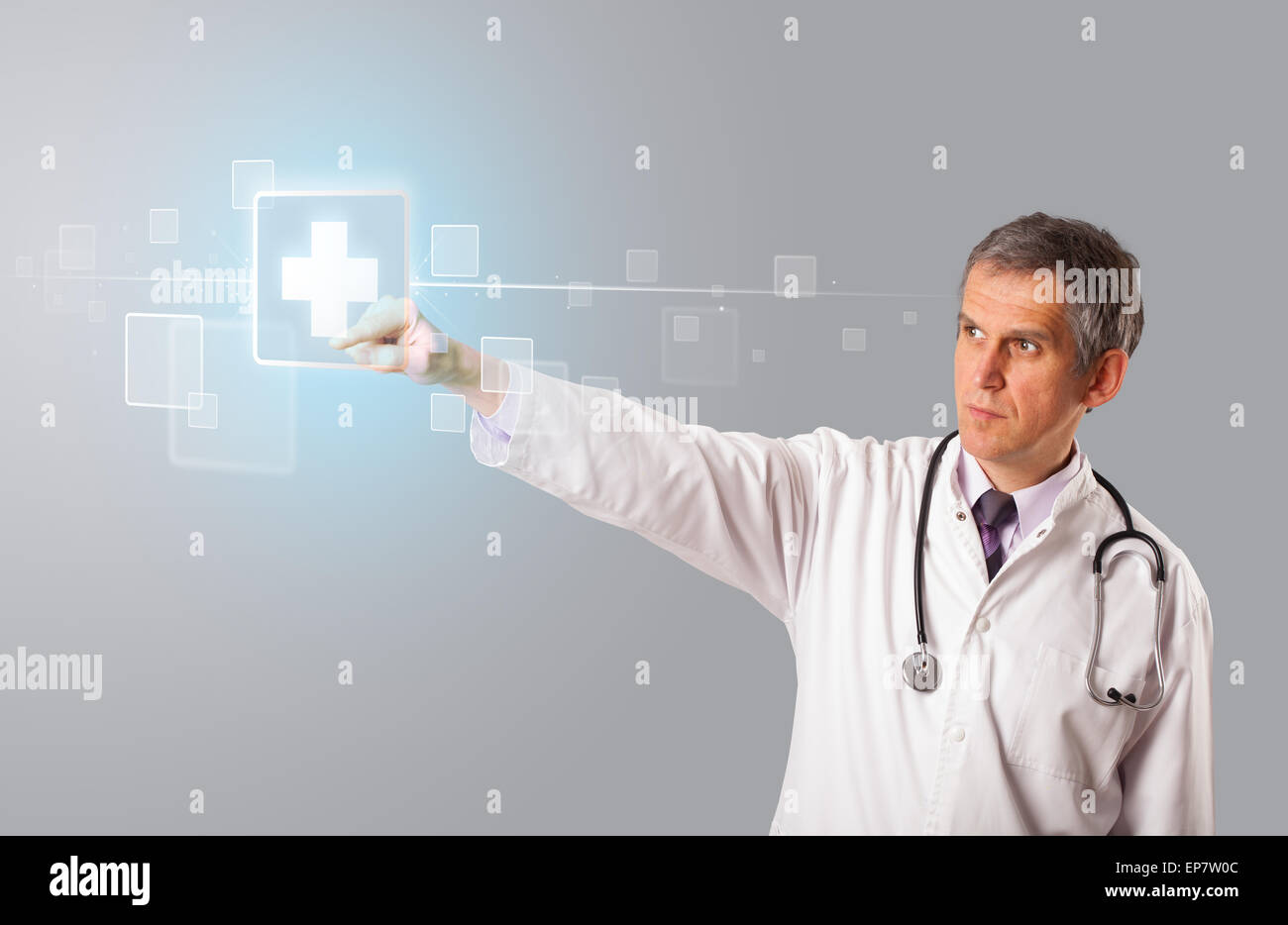 Doctor pressing modern medical type of button Stock Photo - Alamy