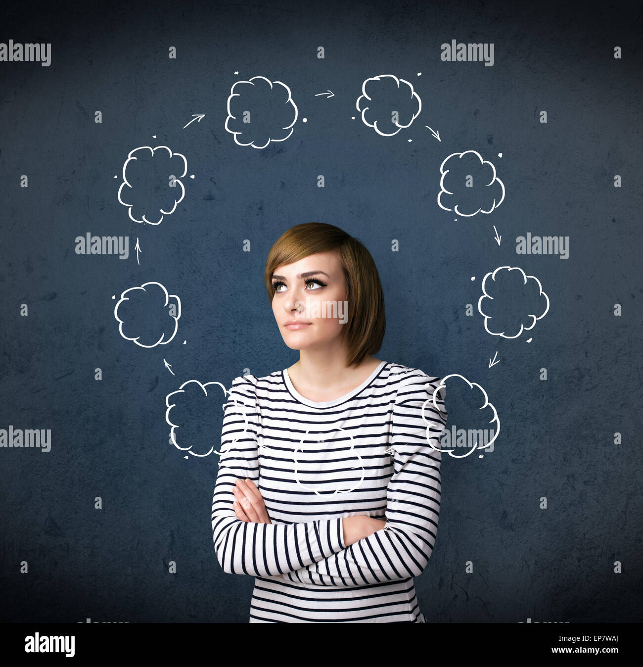 Young woman thinking with cloud circulation around her head Stock Photo ...