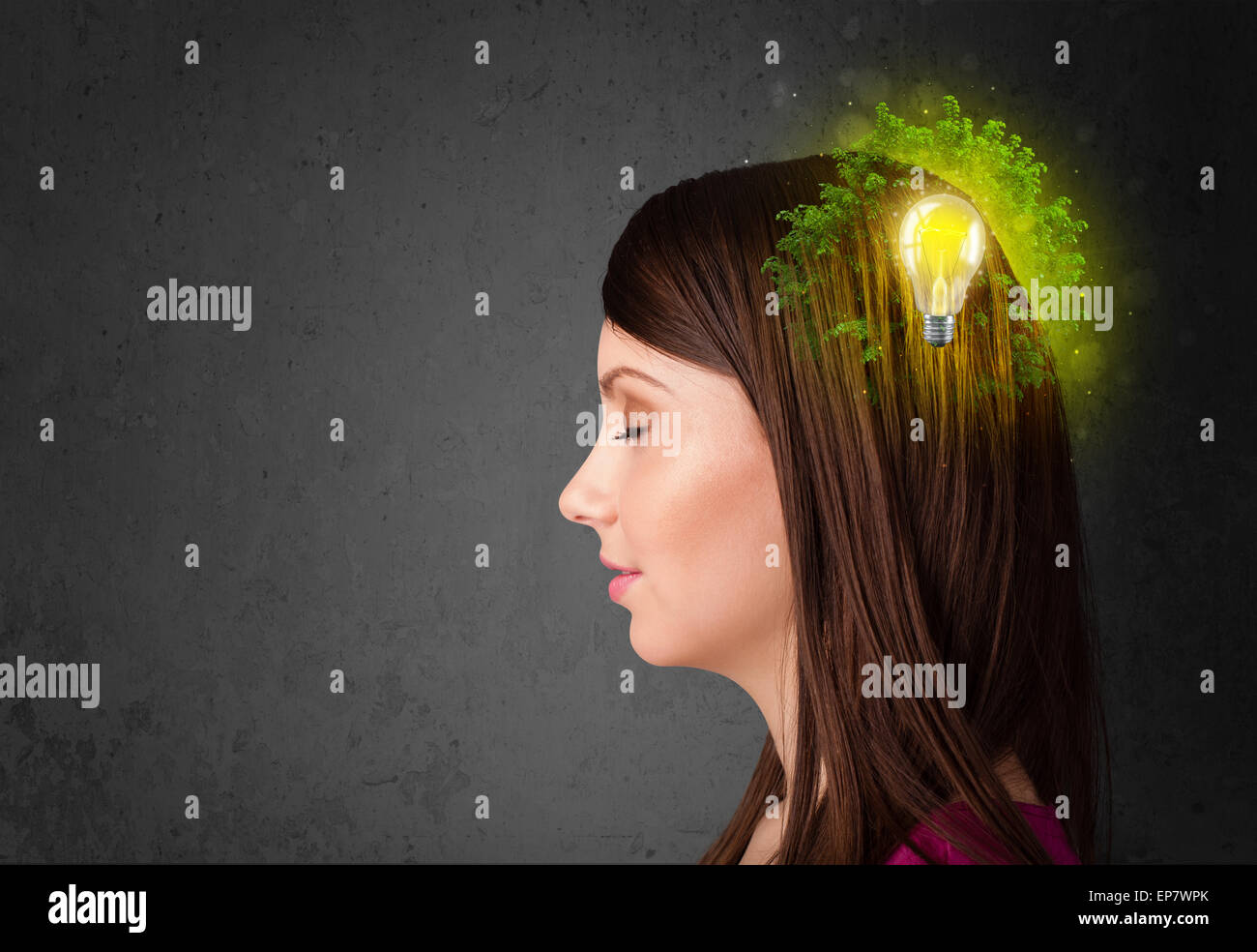 Young mind thinking of green eco energy with lightbulb Stock Photo - Alamy