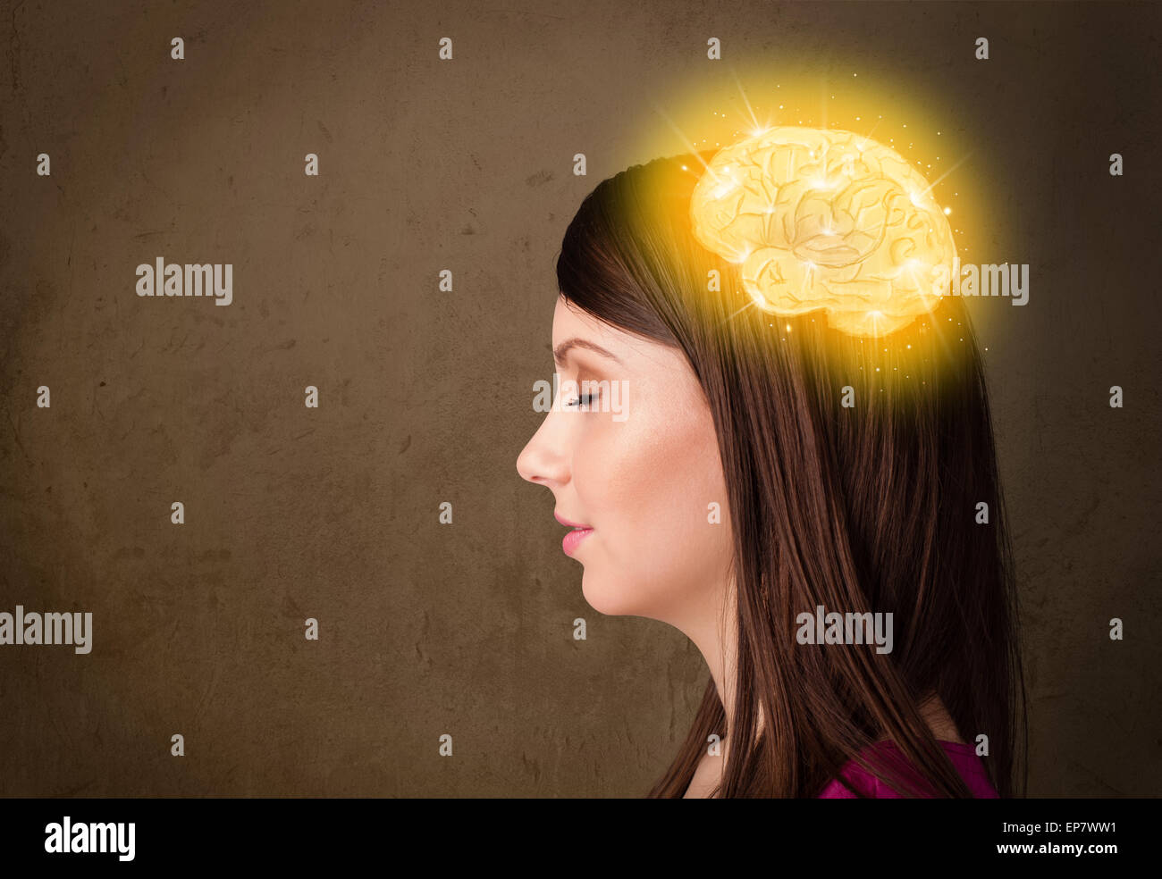 Young girl thinking with glowing brain illustration Stock Photo - Alamy