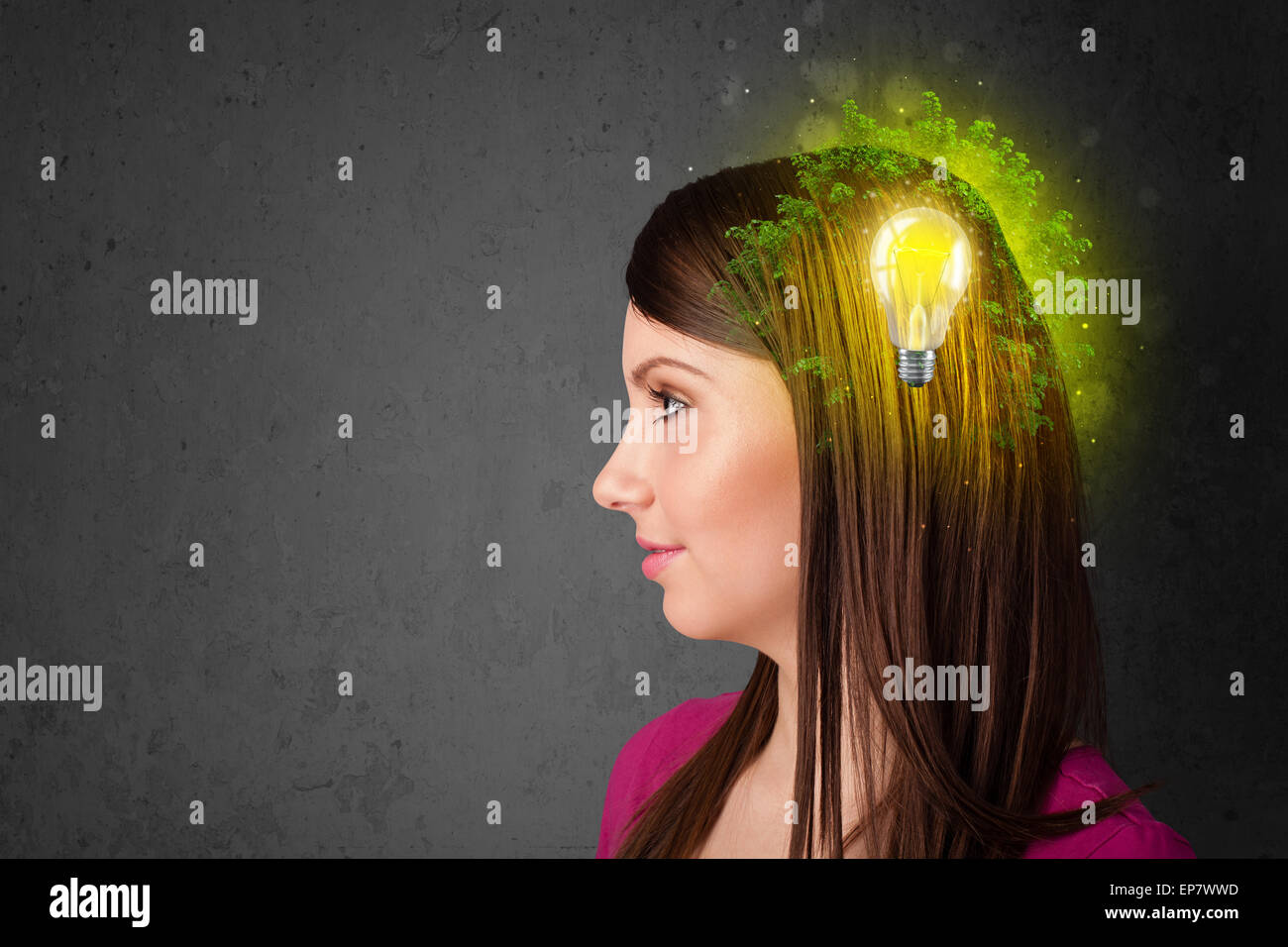 Young mind thinking of green eco energy with lightbulb Stock Photo - Alamy