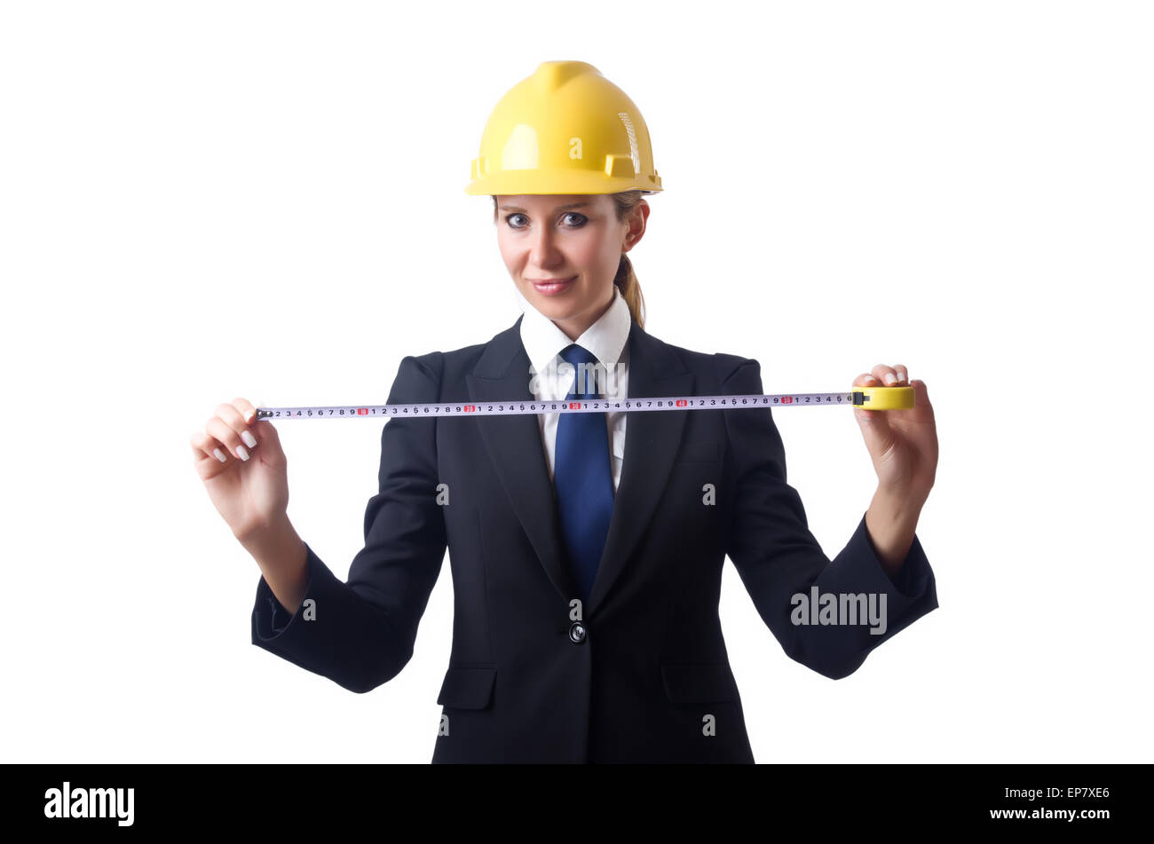 Woman builder with measuring tape Stock Photo - Alamy