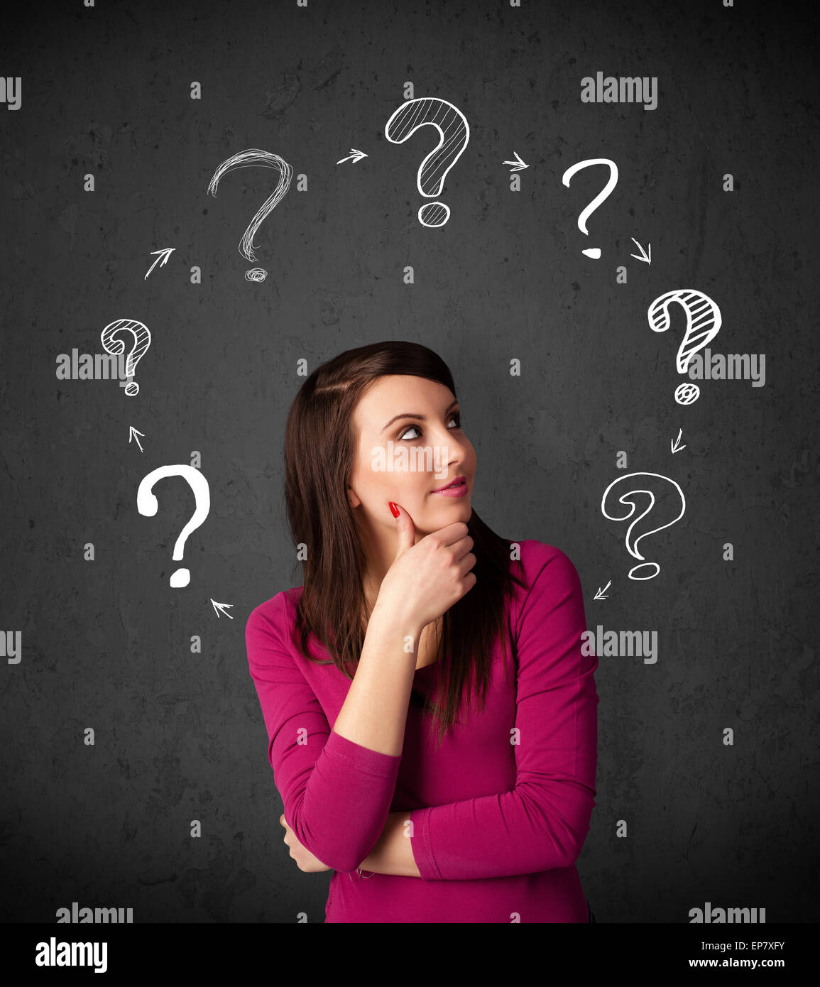 Young woman thinking with question mark circulation around her head ...