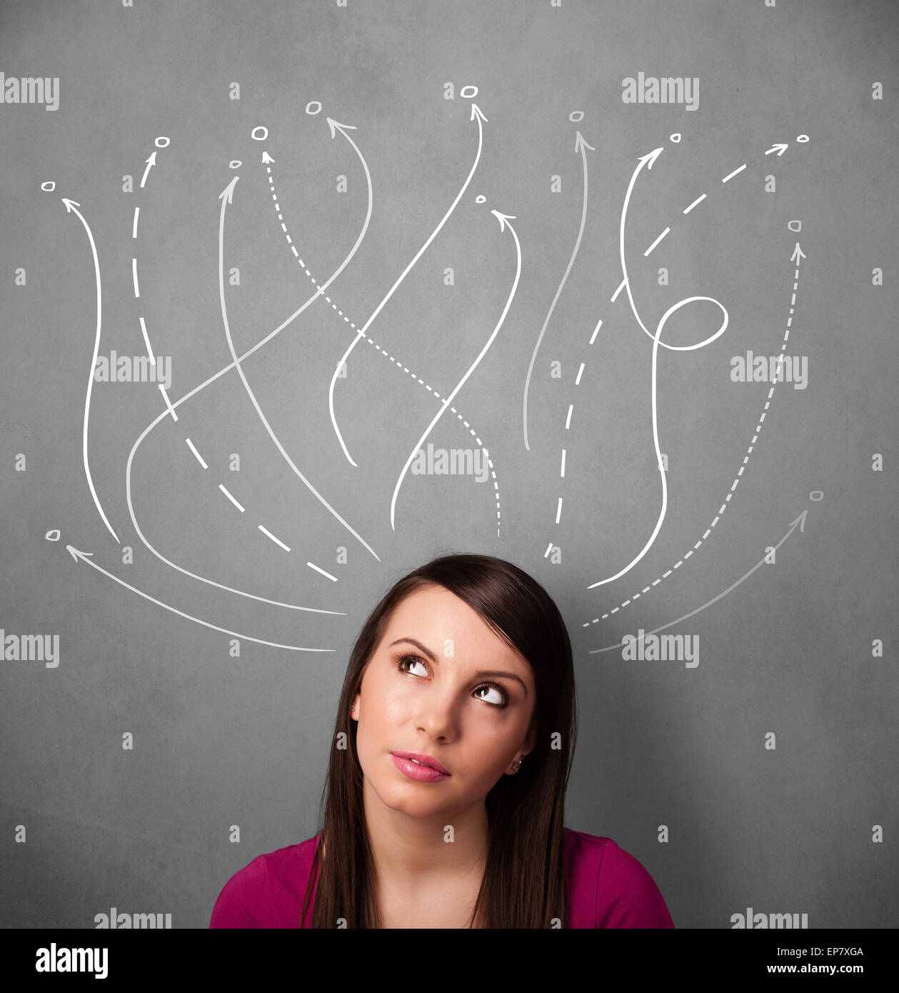 Young woman with arrows coming out of her head Stock Photo - Alamy