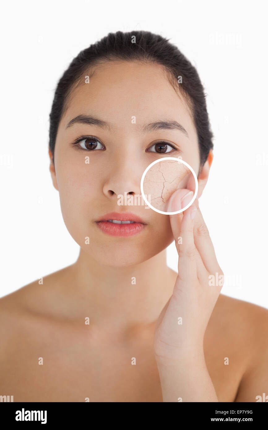 Cute woman touching her skin with close up of her wrinkles Stock Photo ...