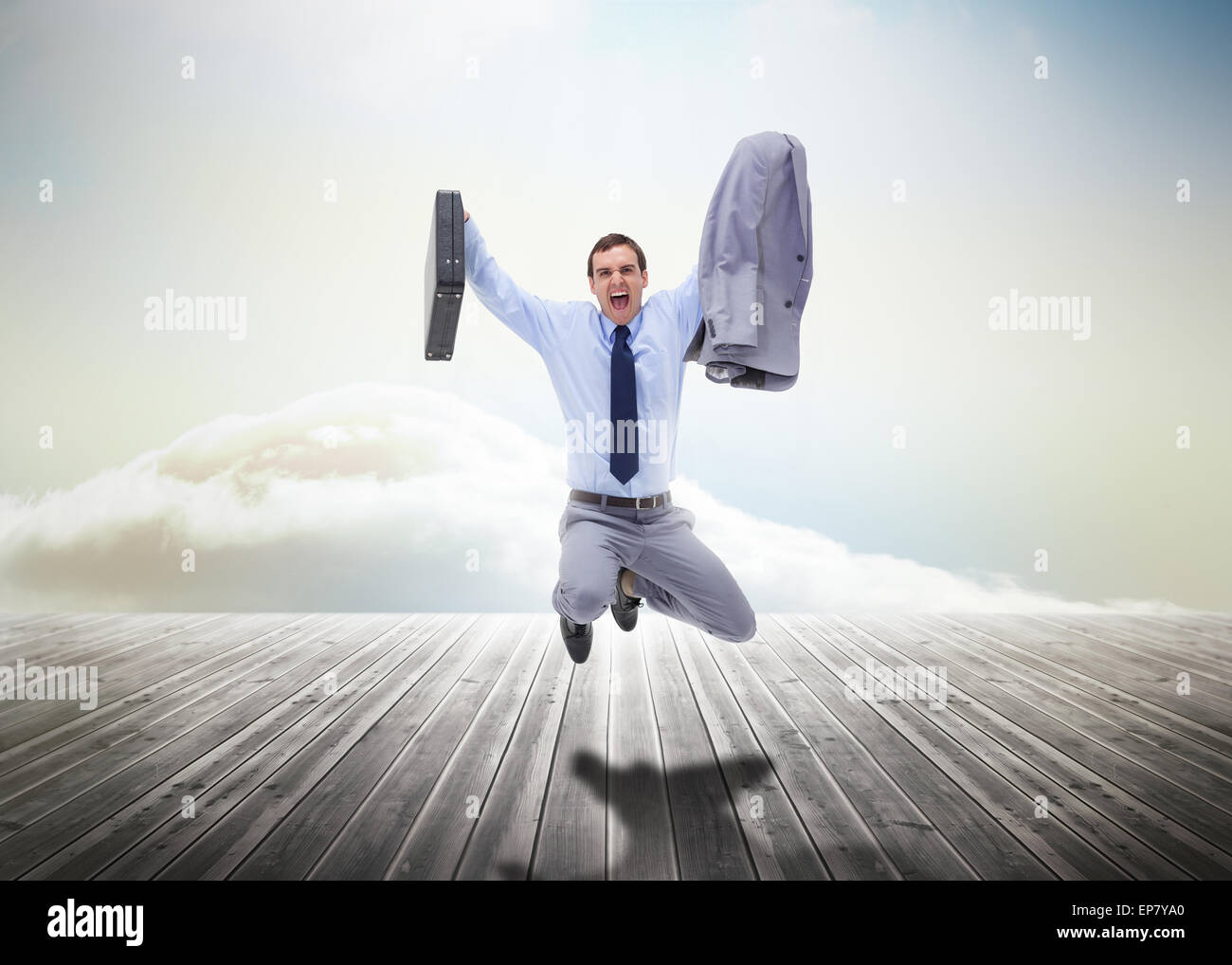 Stressed businessman jumping over wooden boards Stock Photo - Alamy