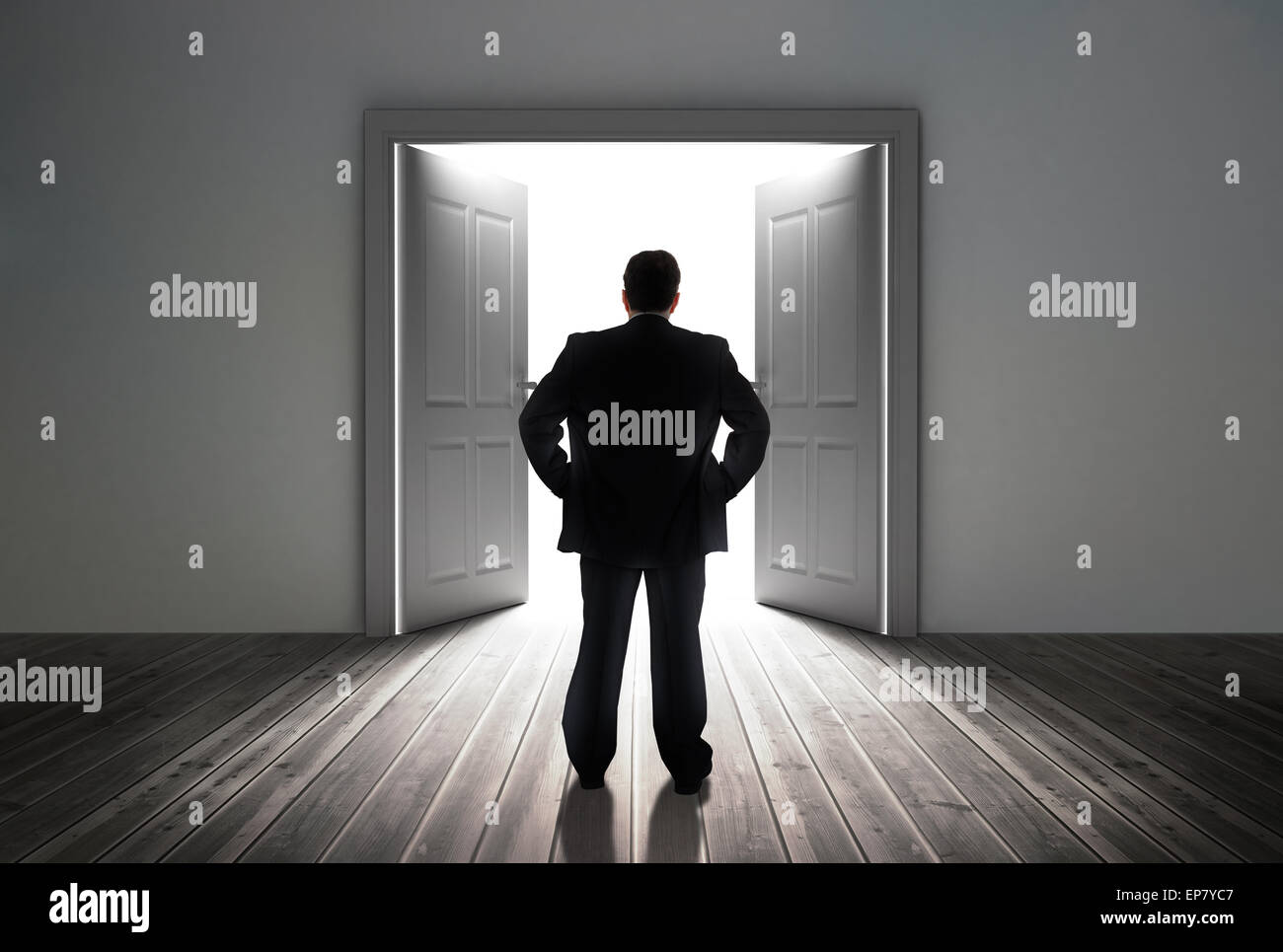 Door opening revealing bright light Stock Photo - Alamy