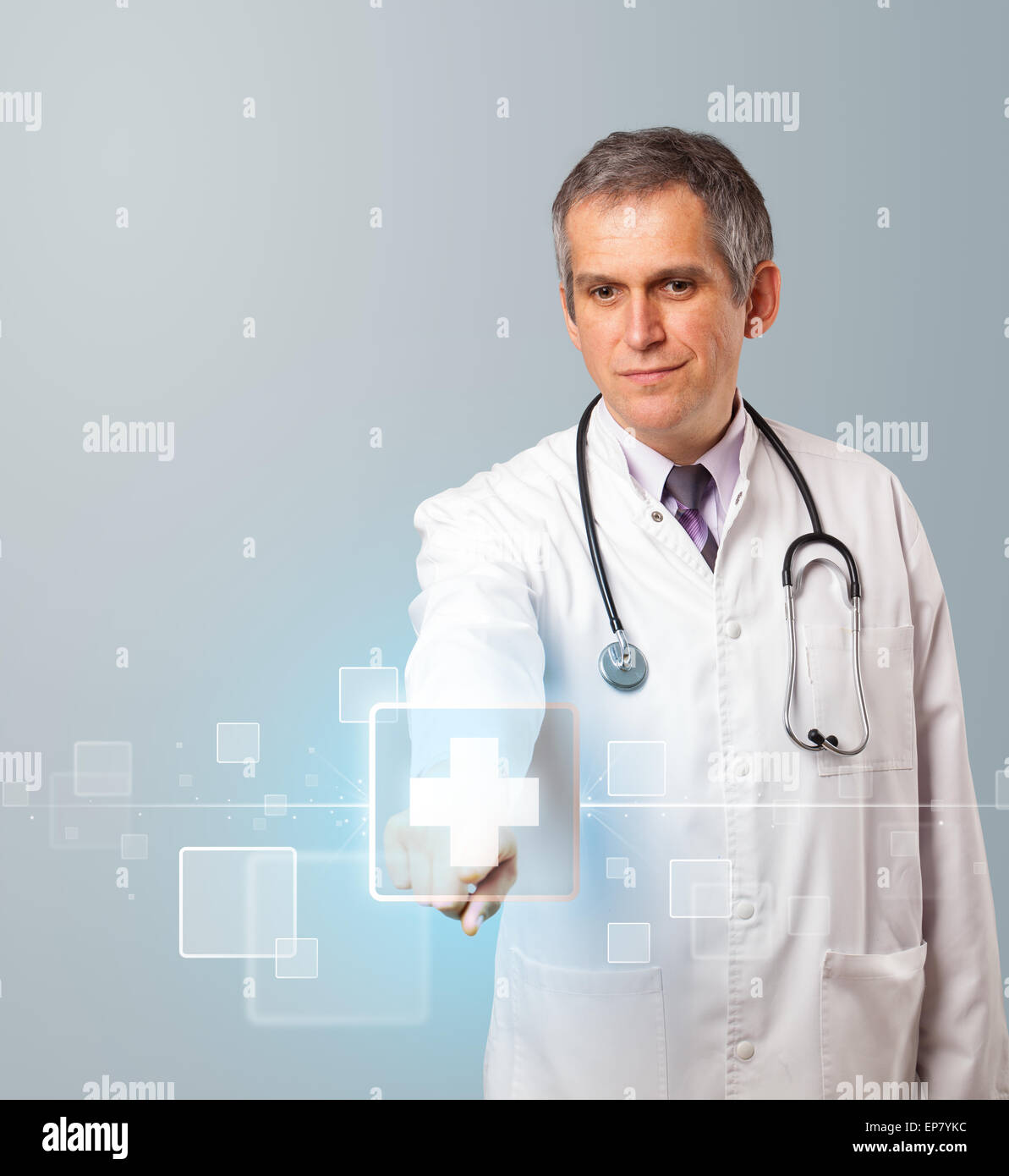 Doctor pressing modern medical type of button Stock Photo - Alamy