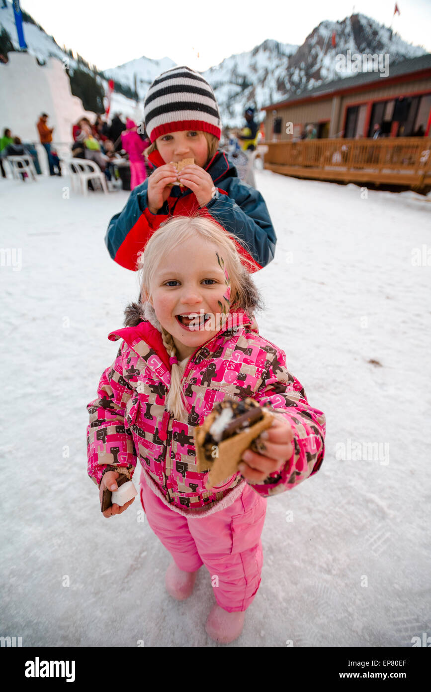 Cute kids eating S'Mores in the snow at Squaw Valley, Lake Tahoe ...