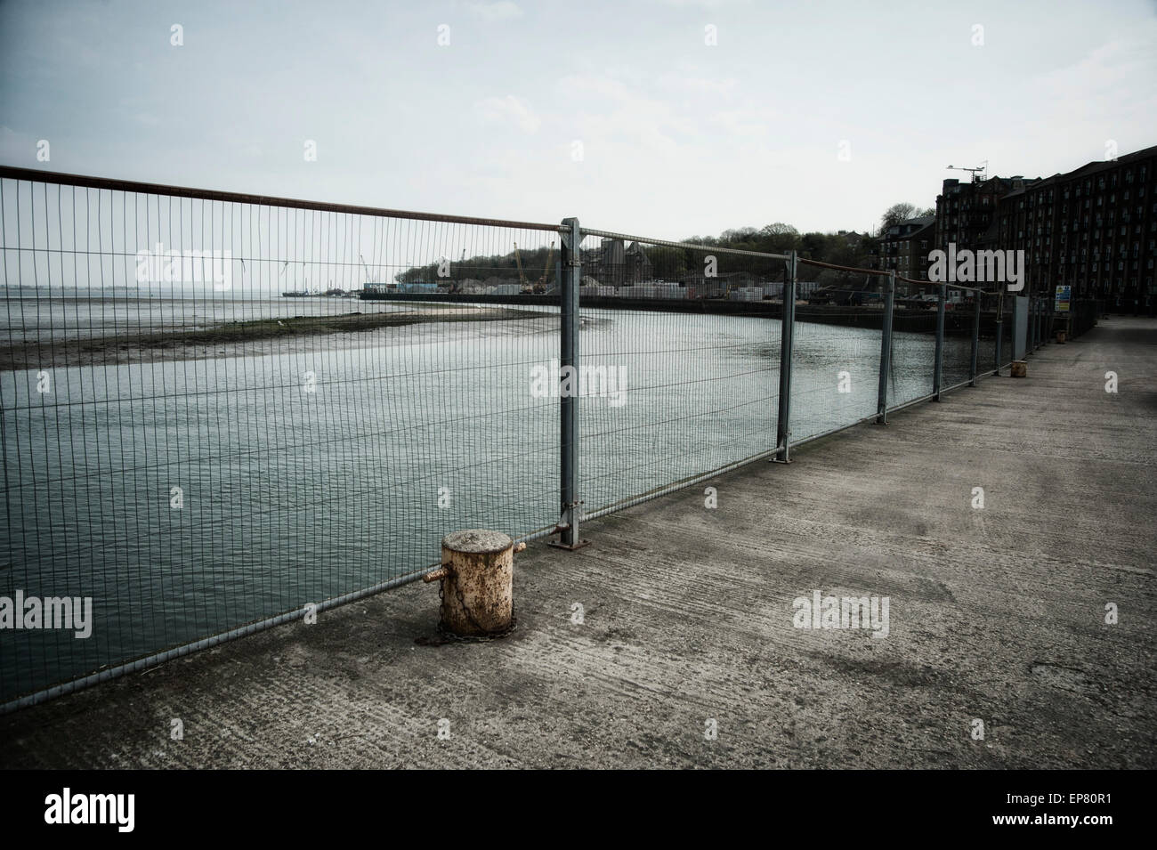 Fence erected along Mistley Quay Stock Photo - Alamy