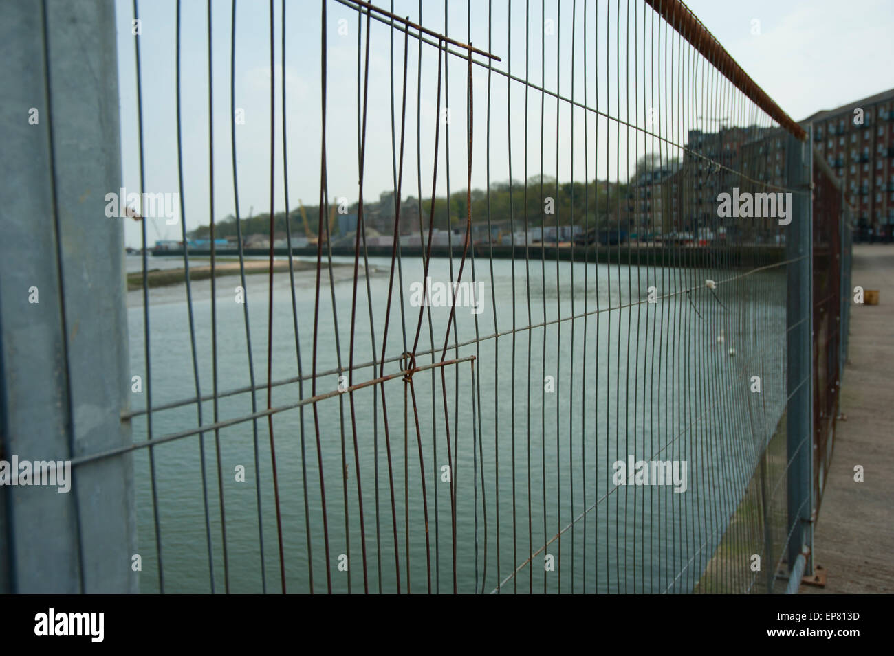 Fence erected along Mistley Quay Stock Photo - Alamy