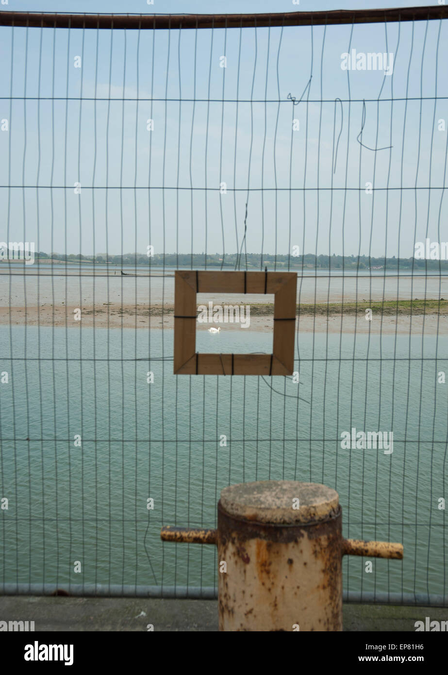 Fence erected along Mistley Quay Stock Photo - Alamy